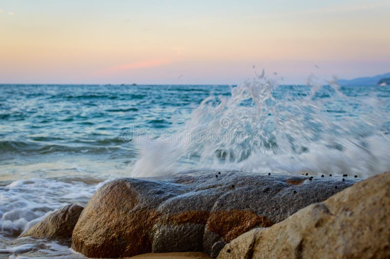 Wave Splash in the Sea Against Stone Stock Image - Image of rocks ...