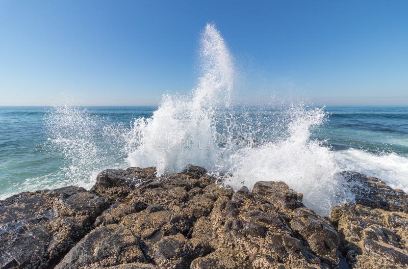 Wave Spray stock photo. Image of bluesky, saltrock, coastline - 93798012