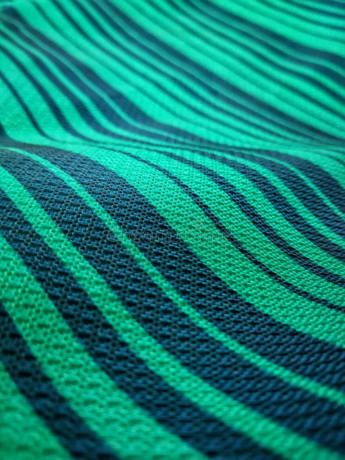 A Wave of Stripes of Green and Navy Blue Colour with a Texture Stock ...