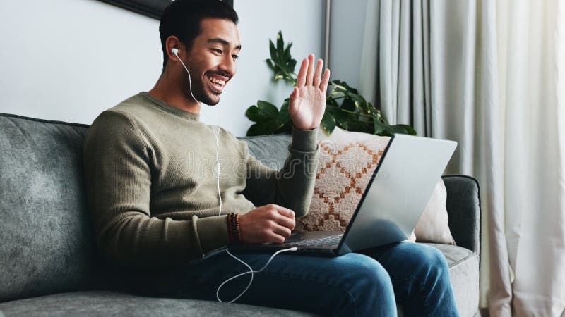Wave, Video Call and Laptop with Man on Sofa for Freelancer, Networking and Welcome. Greeting ...