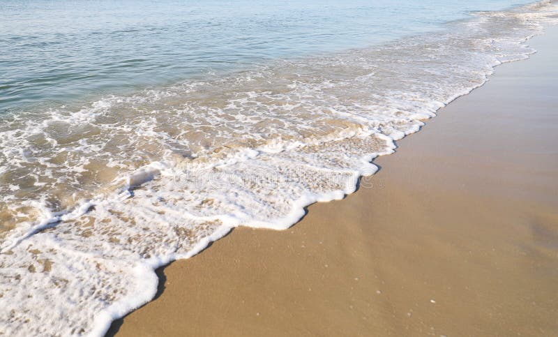 Wave and White Form Along the Beach Stock Image - Image of sandy, space ...