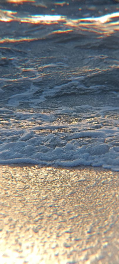 Waves on the Beach that Create Soothing Foam Stock Image - Image of ...