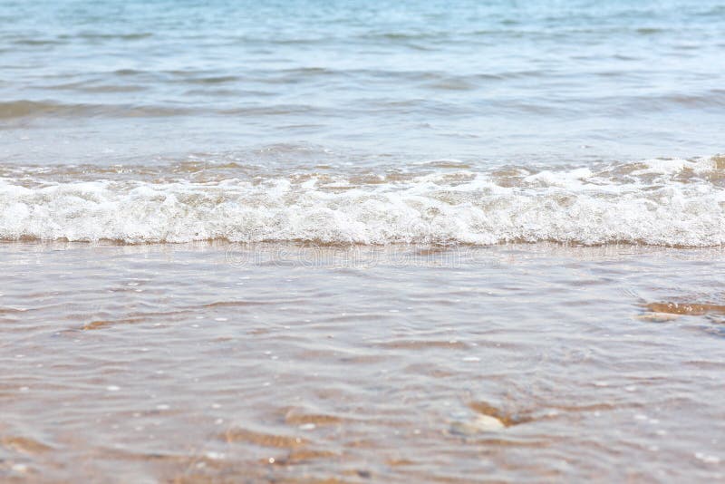 Waves on the beach stock photo. Image of closeup, distant - 87323500
