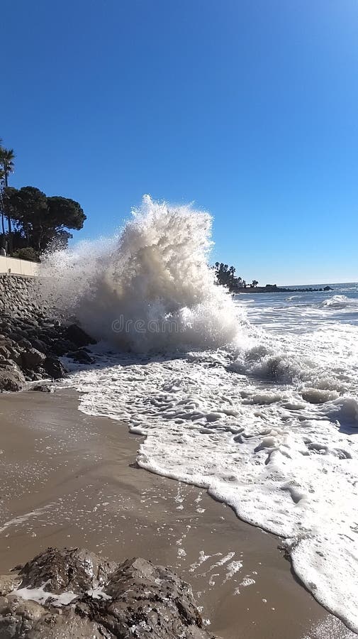 The Waves Beat Against the Rocks and Stir Up Waves Stock Illustration ...