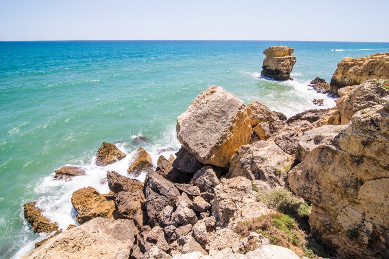 Waves Break about Rocks the Atlantic Ocean at the Coast of Portugal ...