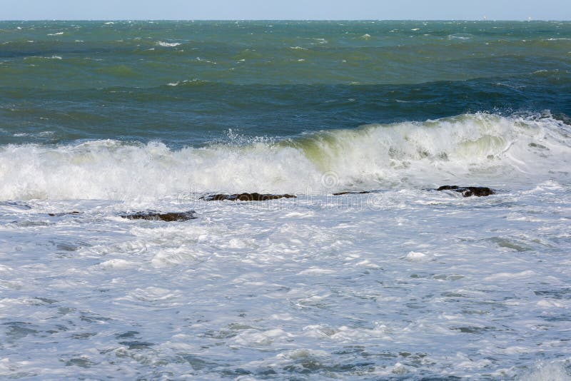 Waves Breaking Against on Rocky Shore: Natural Scenery Stock Photo ...