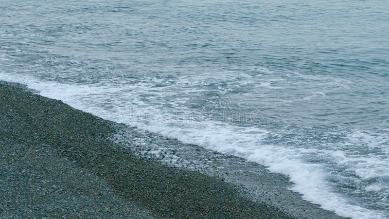 Waves Breaking on the Beach of Pebbles Surf on the Beach. Waves Washing ...