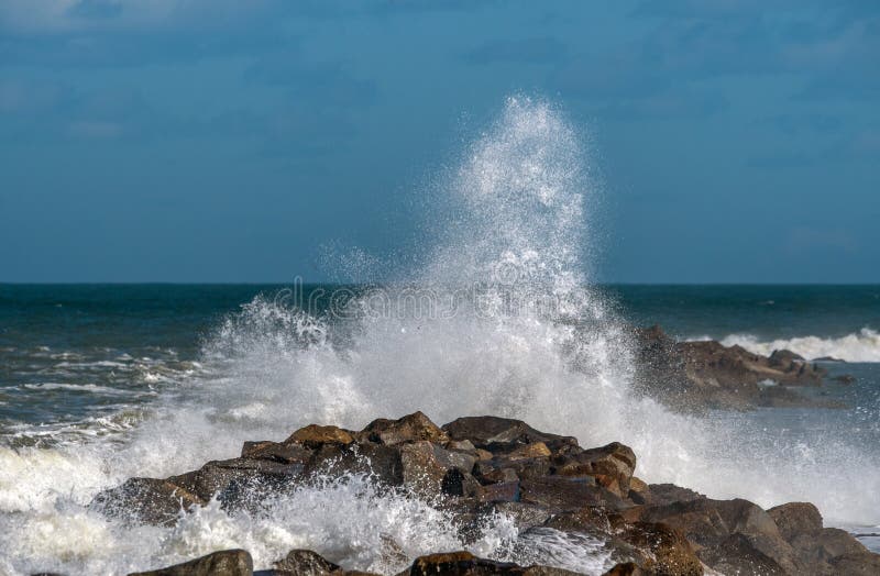 Waves Breaking Over a Rock Jetty Wall. Stock Image - Image of jetty ...