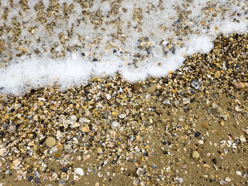 Waves Breaking Over Rocks at a Beach Stock Photo - Image of crash ...