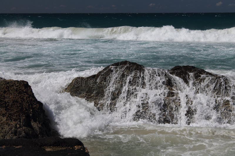 Waves Breaking Over the Rocks at Currumbin, Queensland, Stock Image ...
