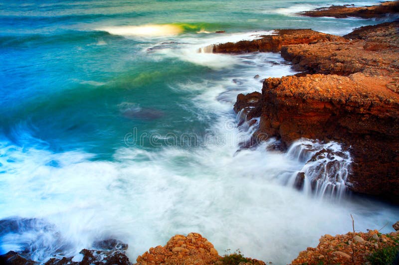 Waves Breaking on the Rocks Stock Photo - Image of paradise ...