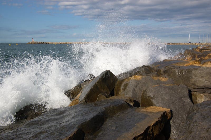 Waves breaking on rocks stock image. Image of seashore - 6494591