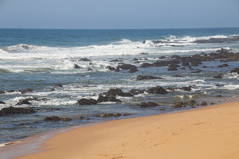 Waves Breaking on Rocks on Beach Shoreline Stock Photo - Image of ...