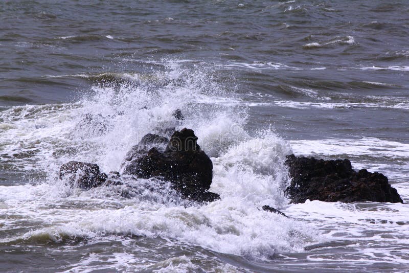 Waves Breaking on the Rocks Stock Photo - Image of storm, huge: 71874510