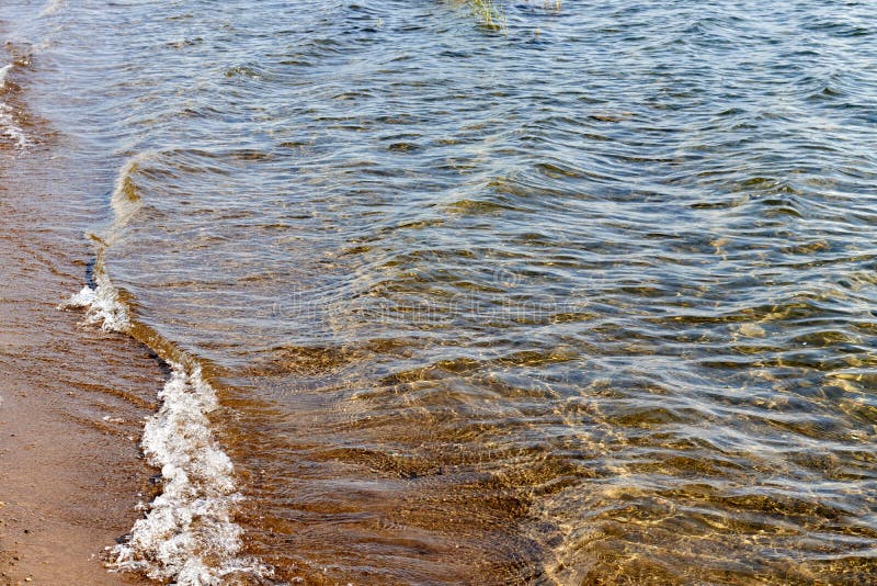 Waves Breaking on the Sandy Shore of the Lake Stock Photo - Image of ...