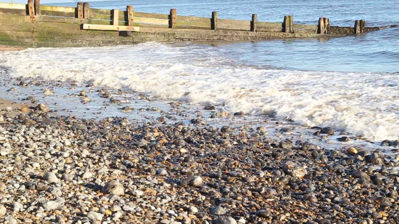 Waves Breaking on a Shingle Beach with Sound. Stock Video - Video of ...