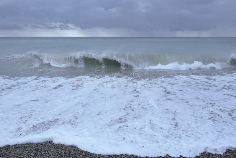 Waves Breaking on the Shore on Small Pebble Beach Stock Image - Image ...