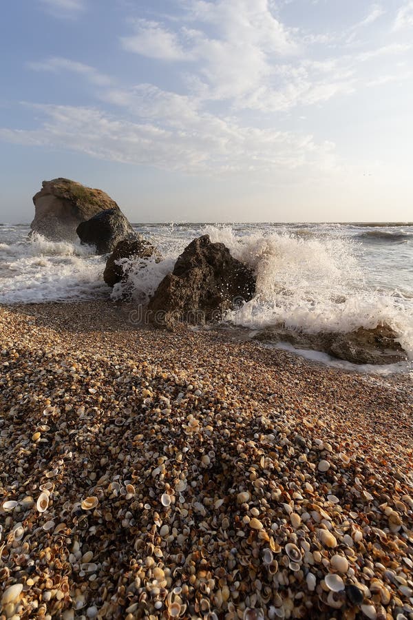 Waves are Bumping Against Rocks. Vertical View Stock Image - Image of ...