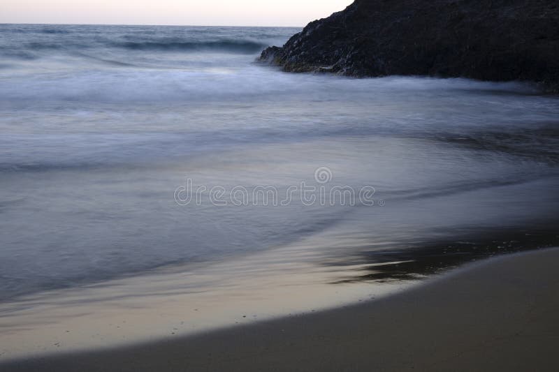The Waves Calmly Approach the Shore of the Beach, Stock Image - Image ...