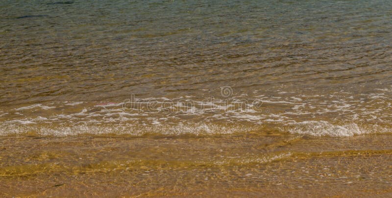 Waves coming into shore stock image. Image of whitecaps - 85606459