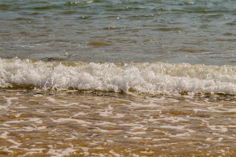 Waves coming into shore stock photo. Image of seaside - 85606746