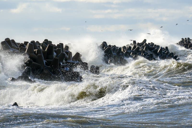 Waves Crash on a Breakwater during Winter Storms Stock Photo - Image of ...