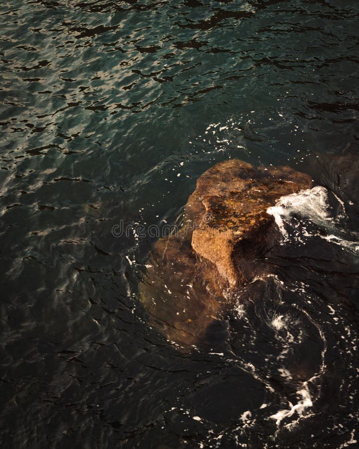 Waves Crash into a Huge Stone by the Beach, Copy Space Stock Image ...