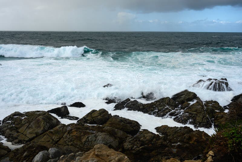 Waves Crash Onto Rocks Along Pacific Coast Stock Image - Image of ...