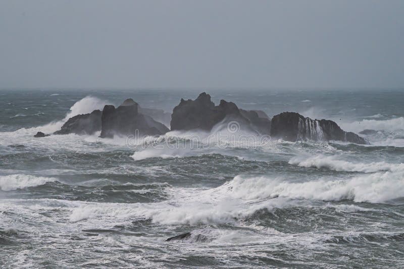Waves Crash on Rocks in Ocean during Storm. Stock Image - Image of ...
