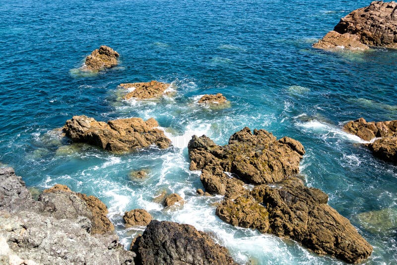 Waves Crashing Against the Rocks Stock Photo - Image of seascape, rough ...