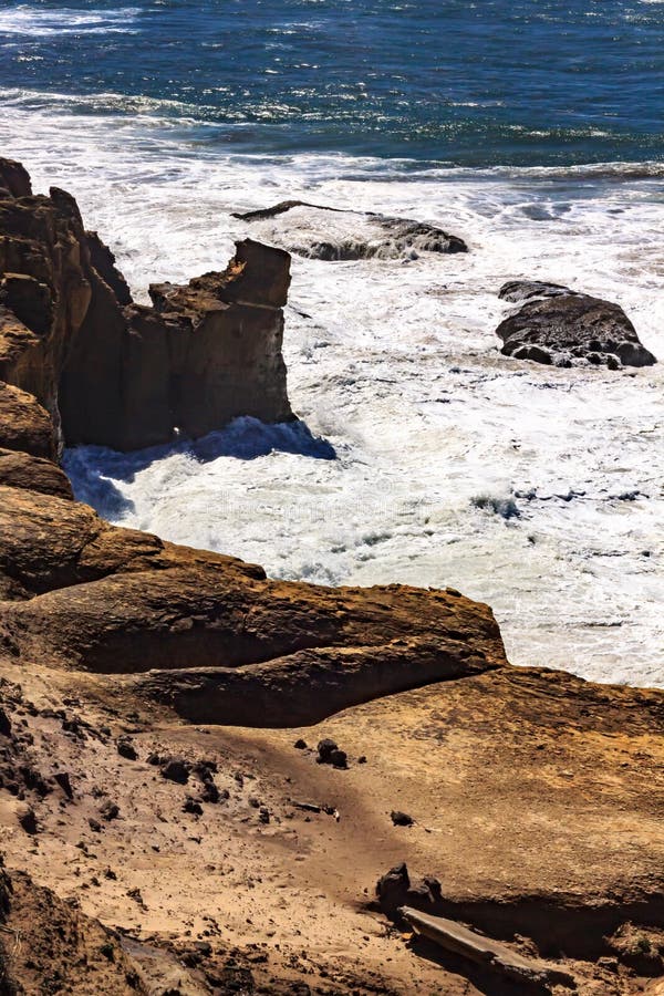 Waves Crashing into Cliff Face Stock Photo - Image of cliff, island ...