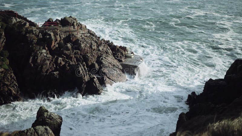 Waves Crashing between the Cliffs of Fanad Head Lighthouse. Coast of ...