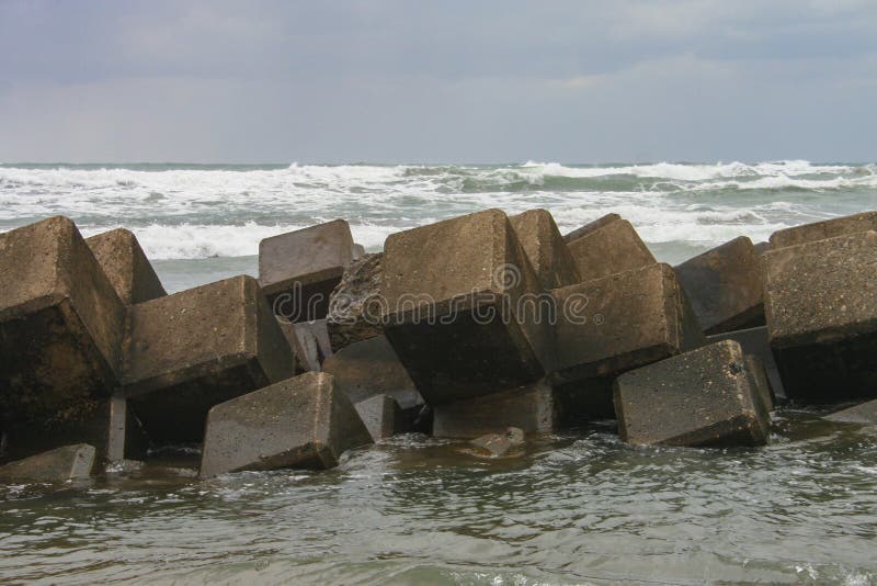 Waves Crashing Over Breakwater of Concrete Blocks, Japan Stock Photo ...