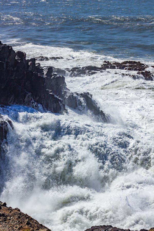 Waves Crashing into Rocks Below Stock Image - Image of rocky, nature ...