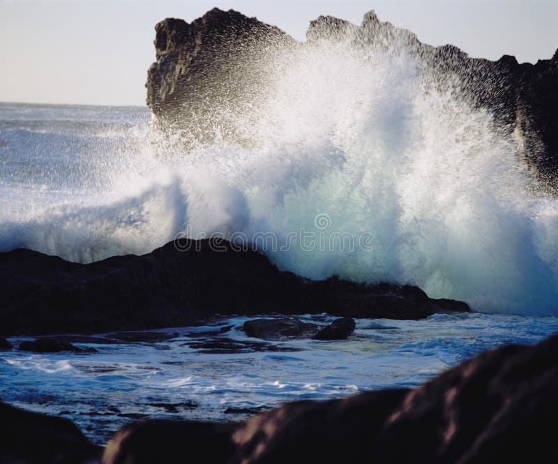 Waves Crashing On Rocks At Sunset, At Victoria Beach Stock Image ...