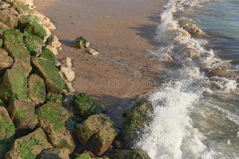 Waves crashing on rocks stock photo. Image of landscape - 380641102