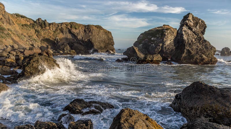 Waves Crashing on a Rocky Coast Stock Photo - Image of light, pacific ...