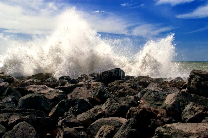 Waves Crashing on Rocks at Sunset, at Victoria Beach Stock Image ...