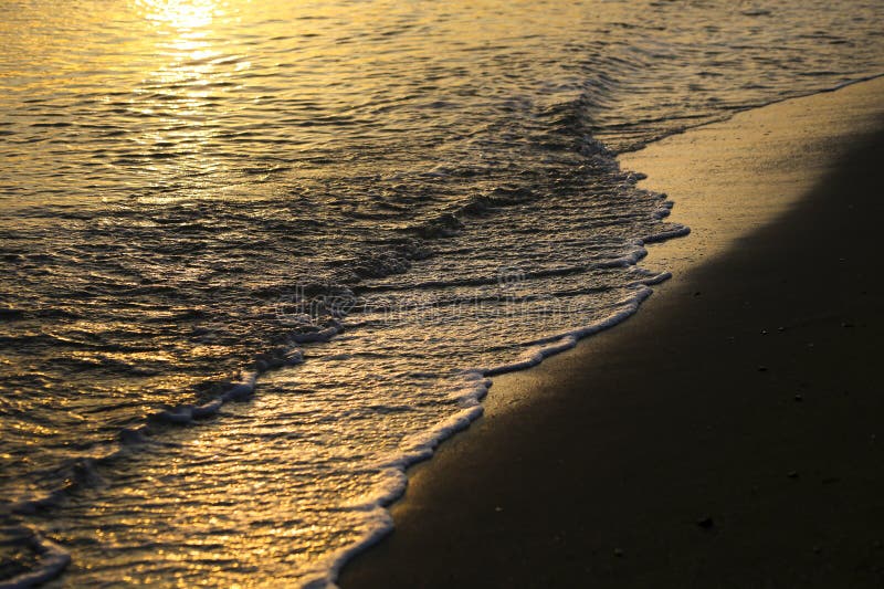 Waves Drawing Geometric Shapes on the Shore Stock Photo - Image of ...