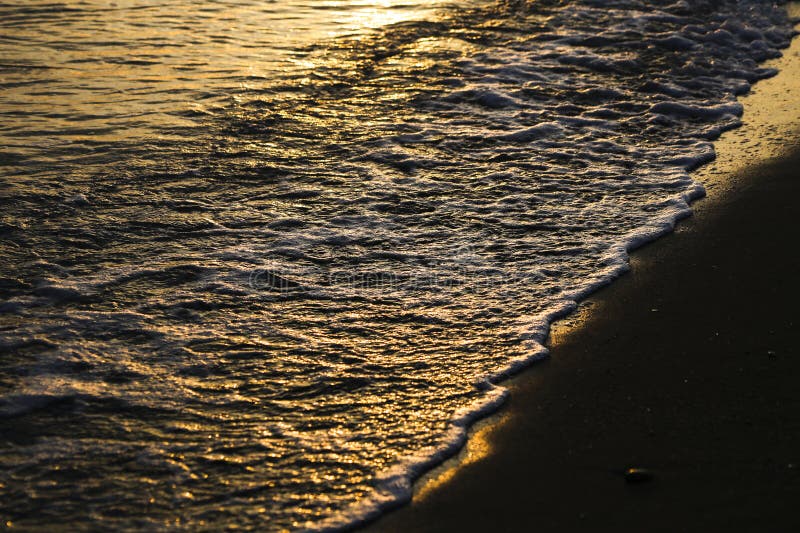 Waves Drawing Geometric Shapes on the Shore Stock Photo - Image of ...