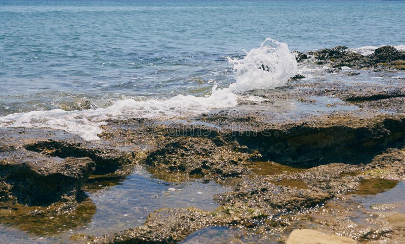 Waves with Foam on Aegean Sea Coast in Crete Greece. Stock Photo ...