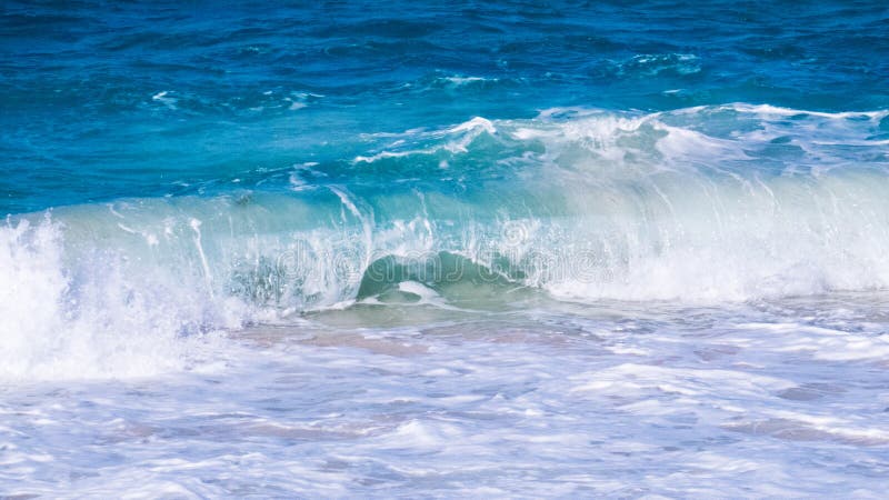 Small Rolling Waves during a Sunny Day at the Beach Stock Image - Image ...