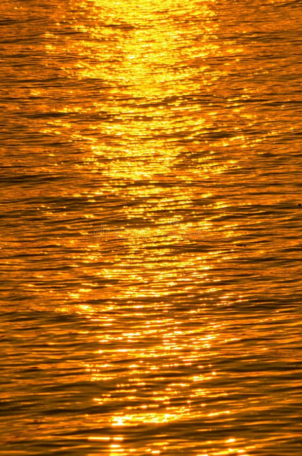 Waves of golden water stock image. Image of refreshing - 134000995
