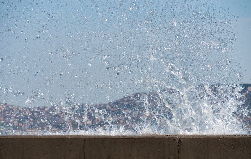 Waves Hit the Concrete Wall and Splashing Sea Water Stock Photo - Image ...