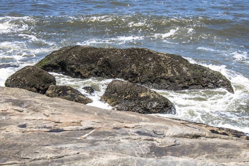 Waves hit the rocks stock photo. Image of spraying, seascape - 111667986