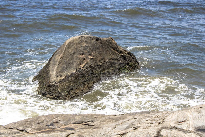 Waves hit the rocks stock photo. Image of outdoor, blue - 111668512