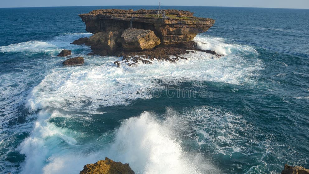 Waves hits rock stock image. Image of formation, independent - 94358735