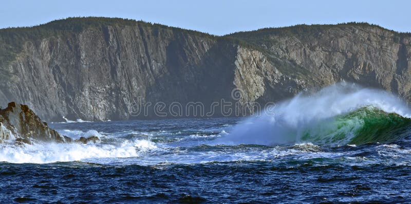 Waves Hitting Cliff Walls in Middle Cove in Newfoundland Stock Photo ...