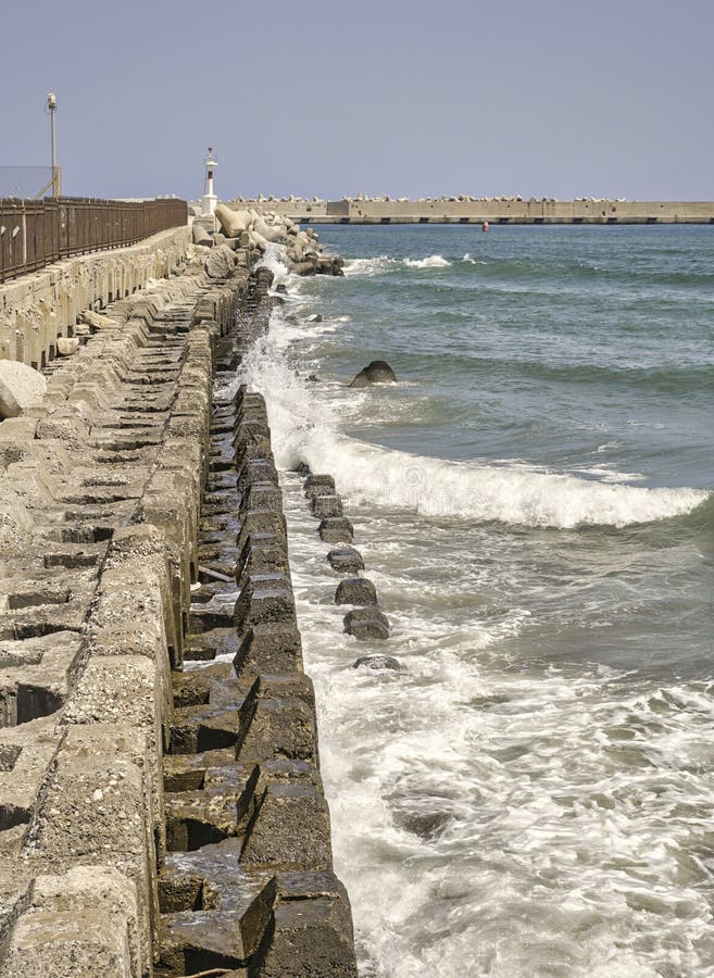 Waves Hitting the Harbour Wharf at Rethymno in Crete Stock Photo ...