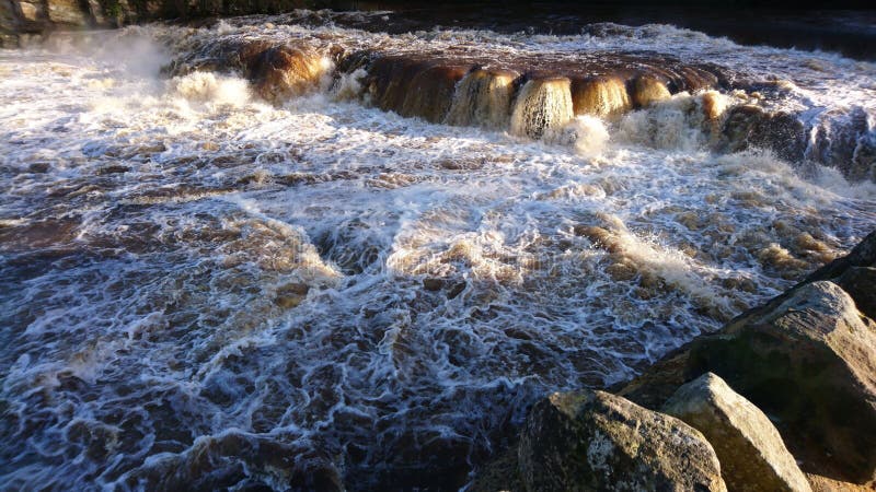 Waves Hitting Over Rocks in a River Stock Photo - Image of outdoors ...